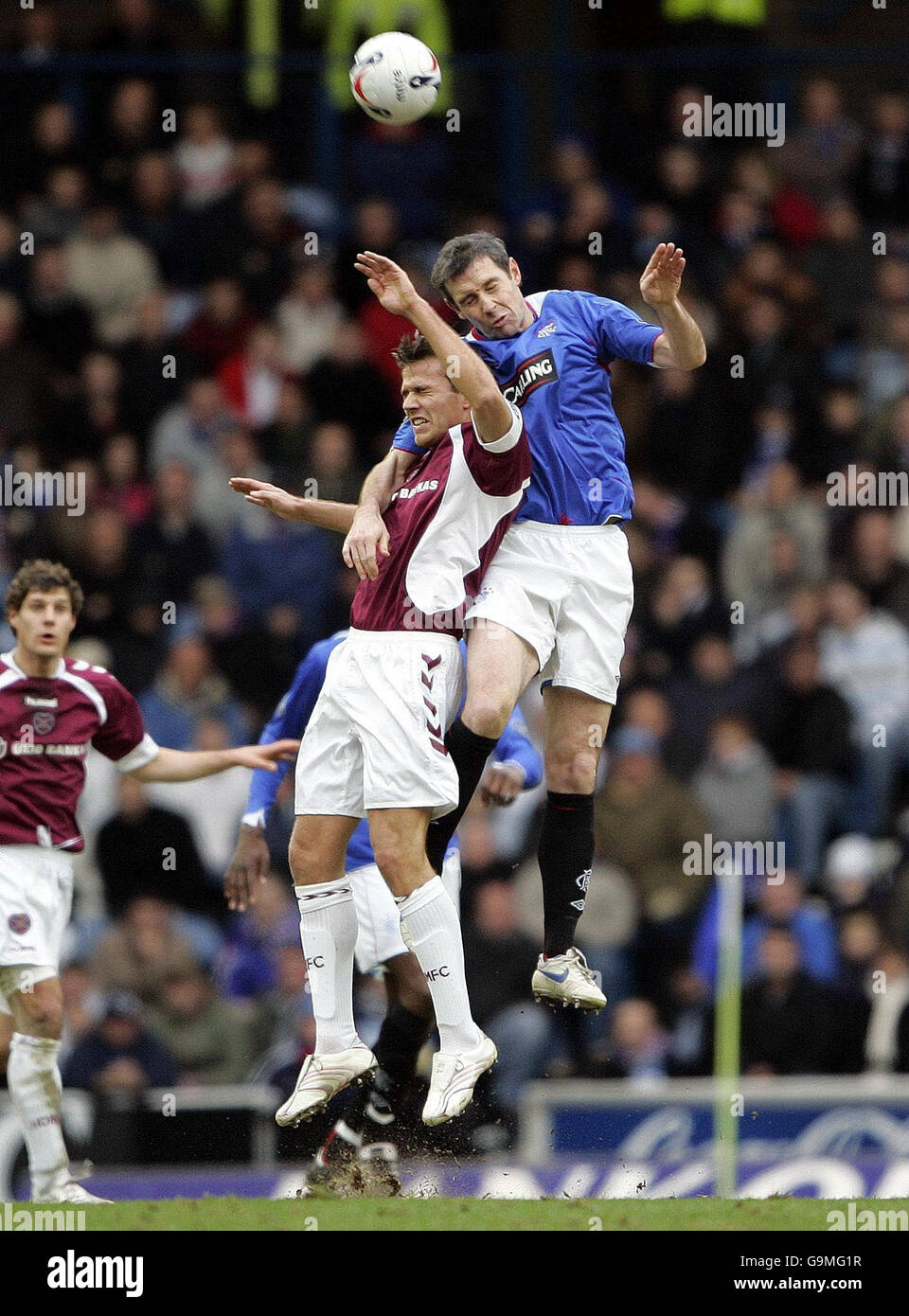 Ranger's David Weir (right) challenges Heart's Roman Bednar during the ...