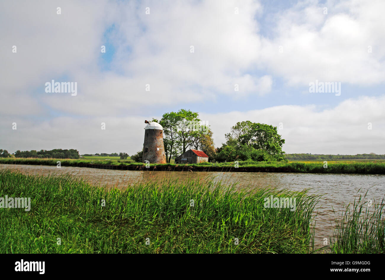 A view of the River Bure on the Norfolk Broads with disused Oby ...