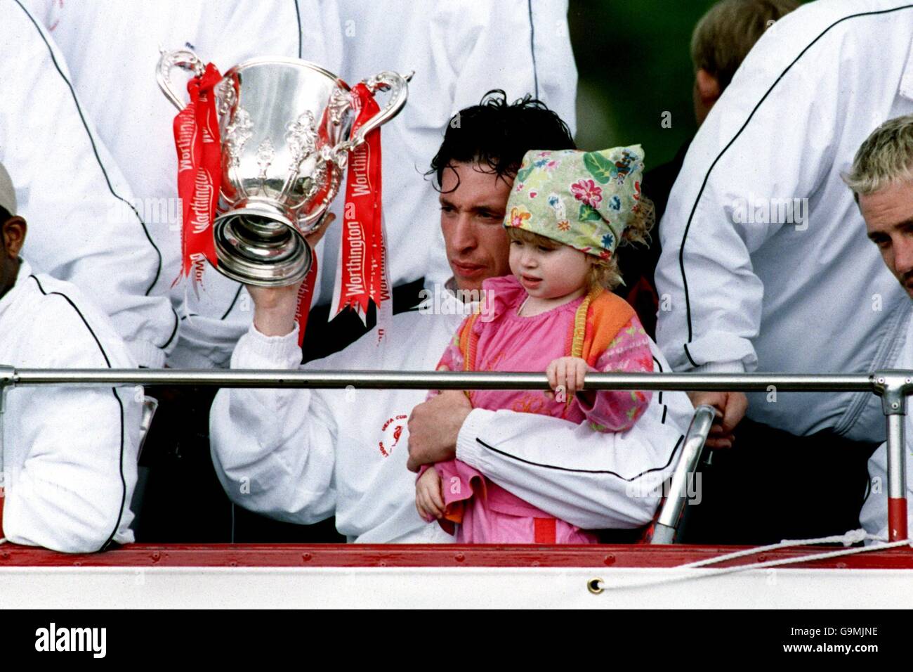 Soccer - Liverpool Trophy Parade. Robbie Fowler of Liverpool holds up ...