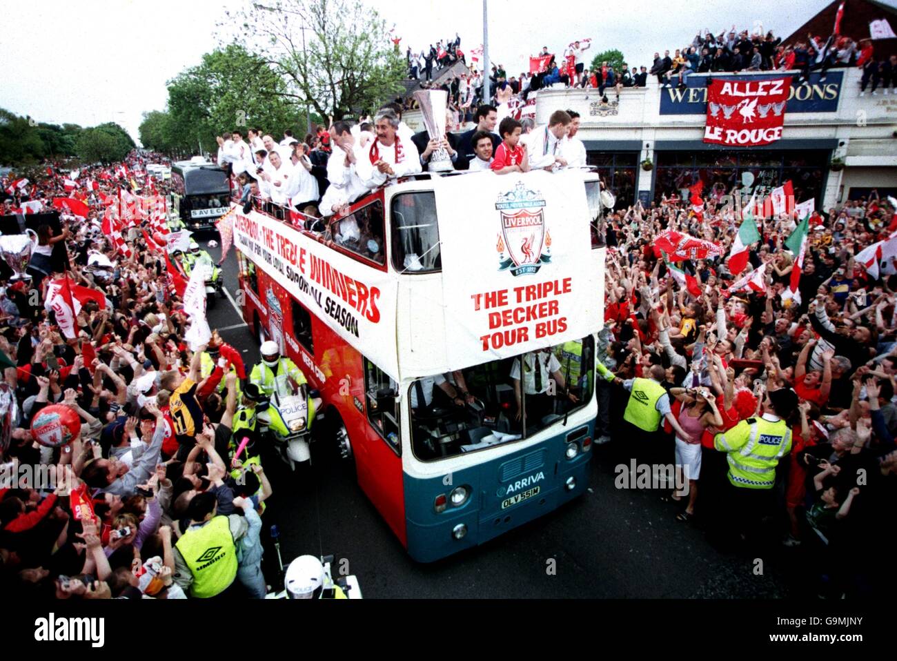 Soccer - Liverpool Trophy Parade. Liverpool fans line the streets as the team parade the three ...
