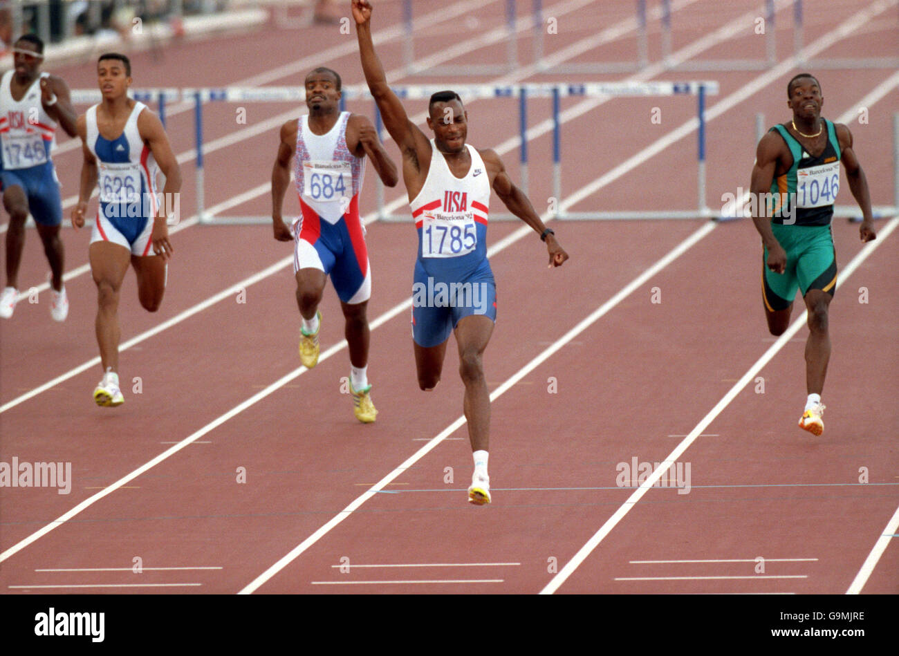USA's Kevin Young celebrates as he races away to win gold in a new ...