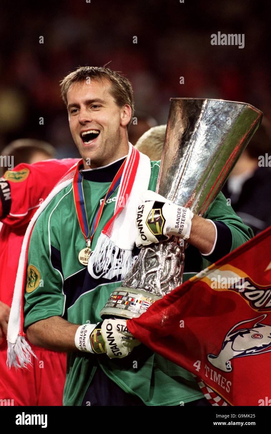 Liverpool goalkeeper Sander Westerveld shows his delight as he holds ...