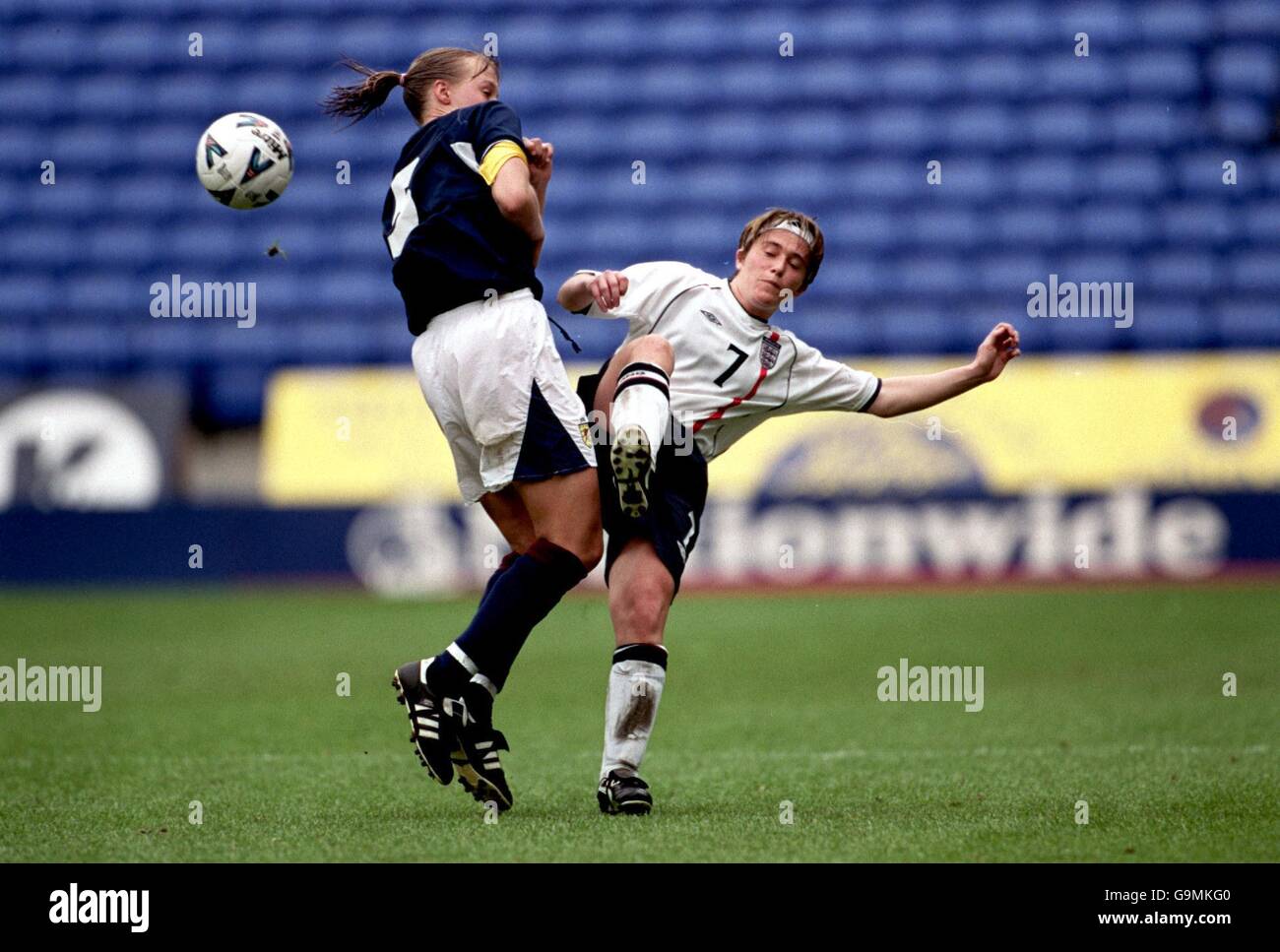 Englands karen burke tackles scotlands michelle barr hi-res stock ...