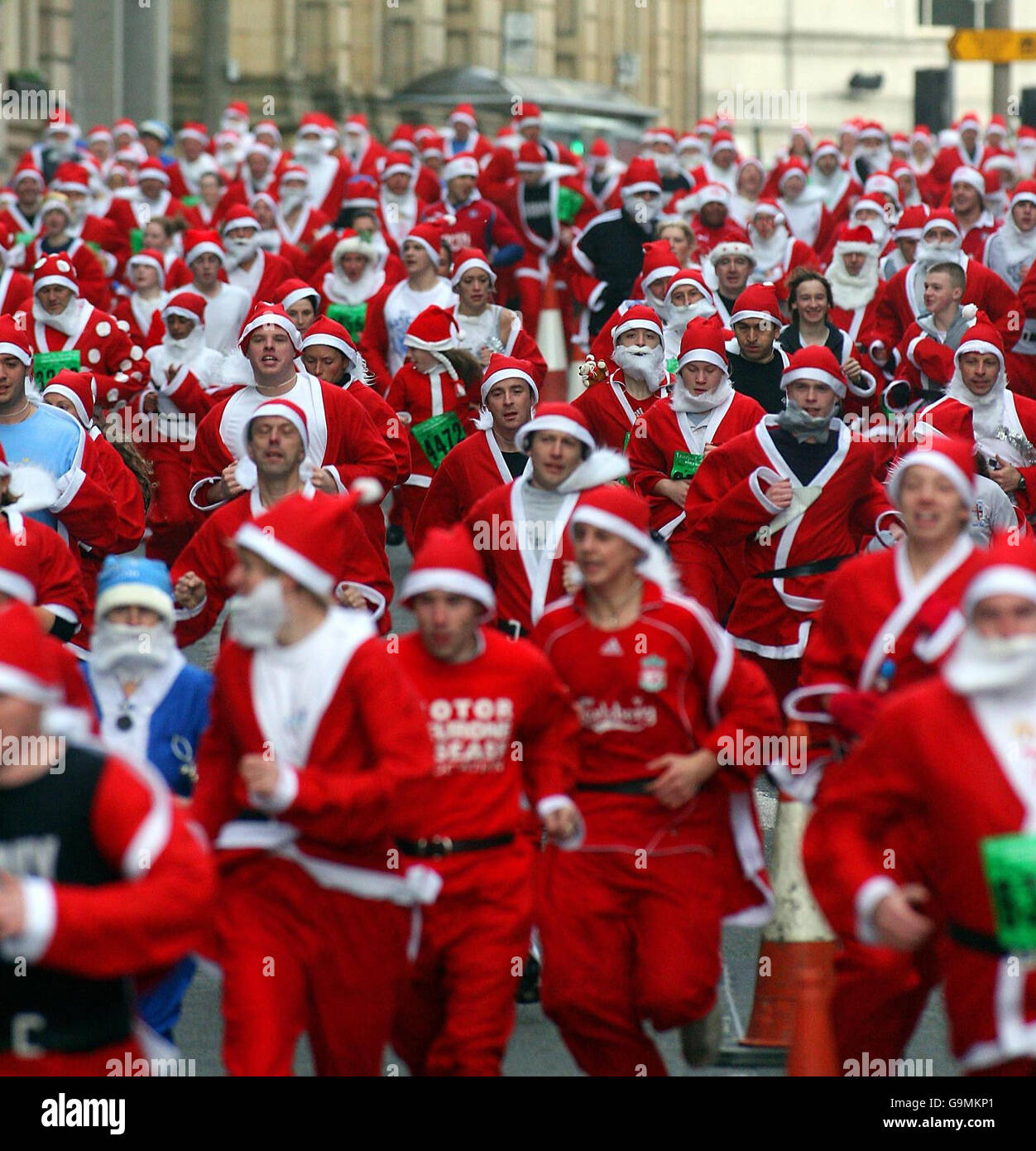 People take part in the Santa Run in Liverpool City Centre Stock Photo ...