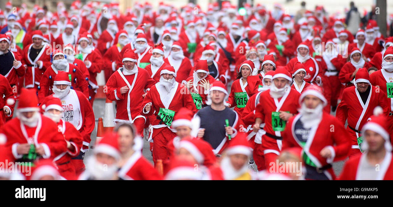 People take part in the Santa Run in Liverpool City Centre Stock Photo ...