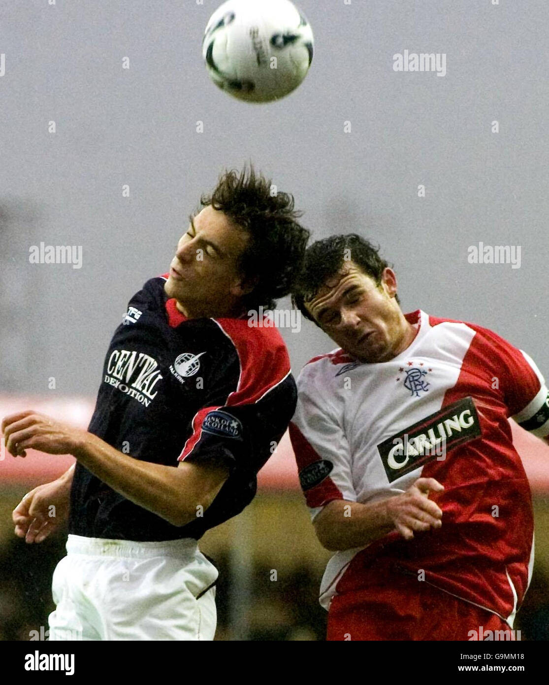 Rangers captain Barry Ferguson (right) and Alan Gow of Falkirk battle ...