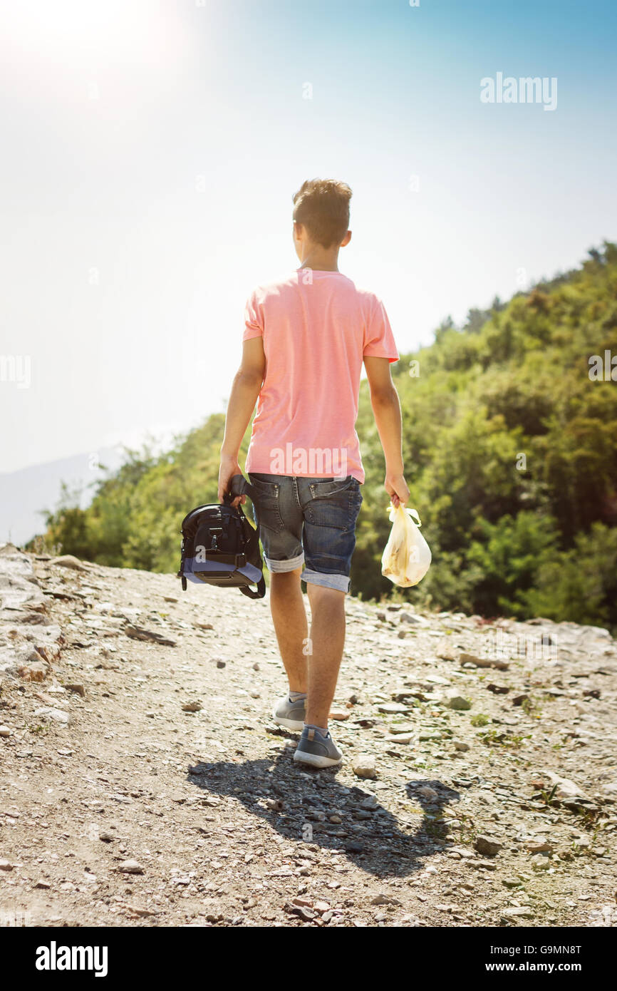 Back view of man hiking hi-res stock photography and images - Alamy