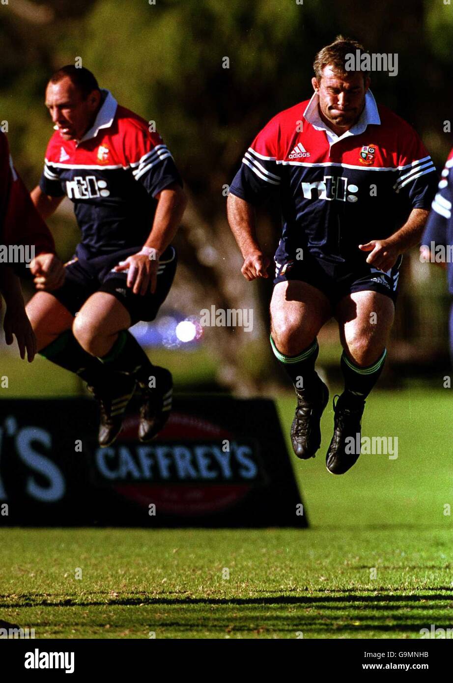 British Lions Jason Leonard and Robin McBryde warm up during training ...