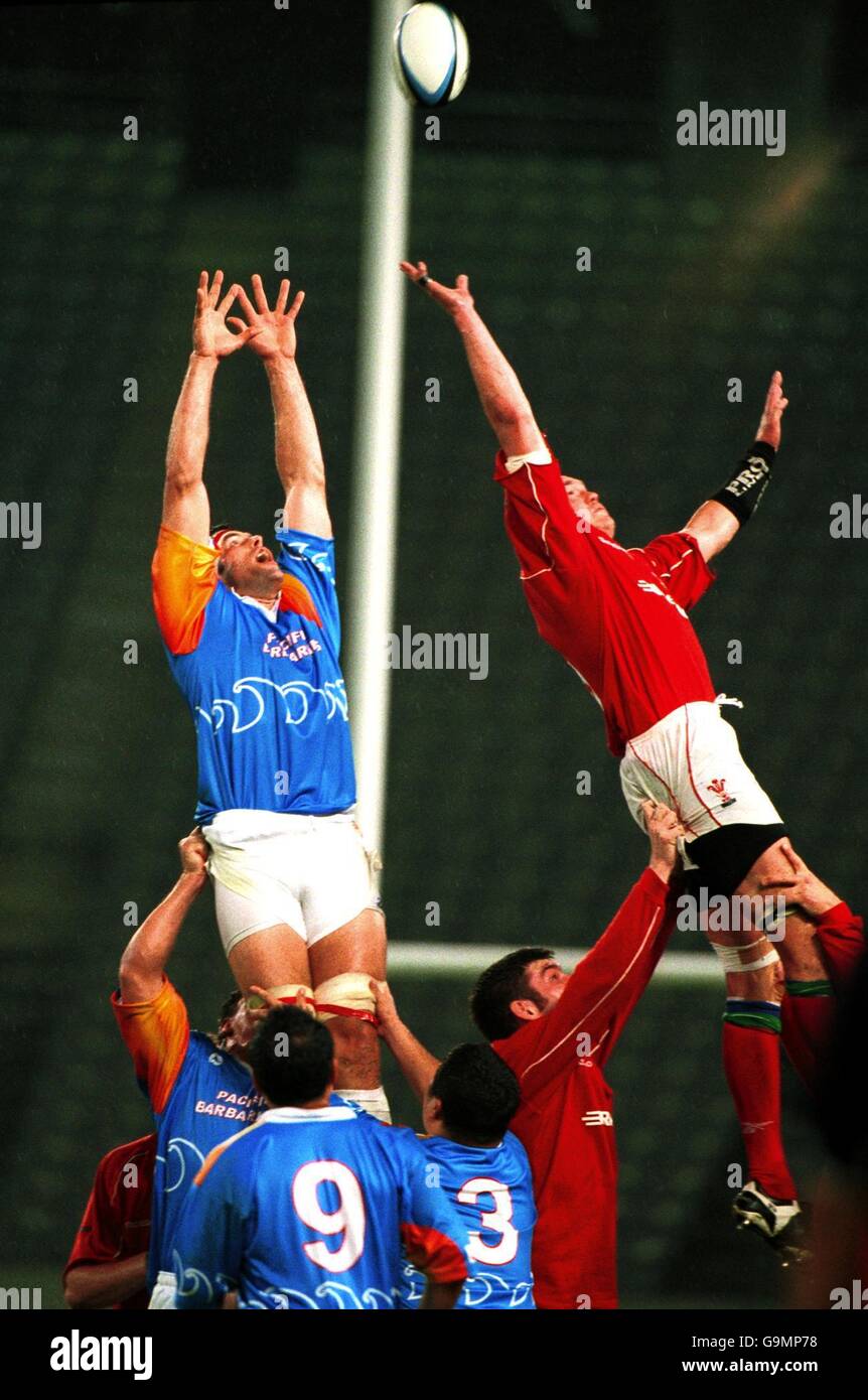Jamie Washington of the Pacific Barbarians and Chris Stephens of Wales ...