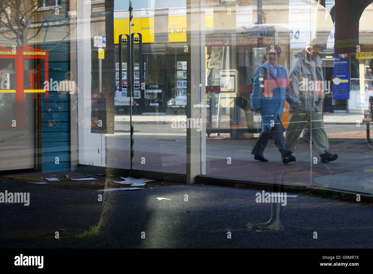 Shoppers pass empty shop units in the Southsea area of Portsmouth ...