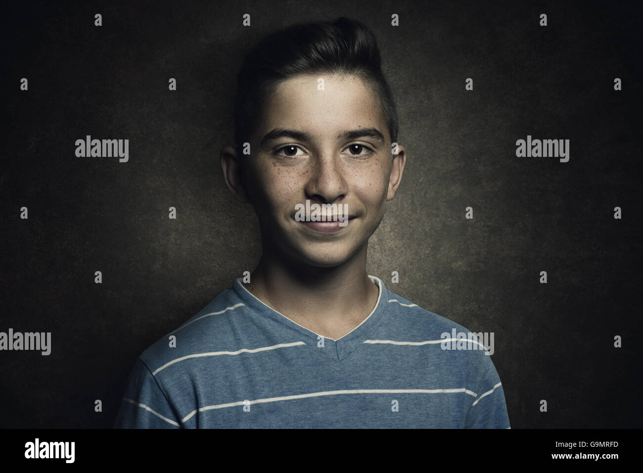 smiling teen in front of painted backdrop in vintage sepia look Stock ...