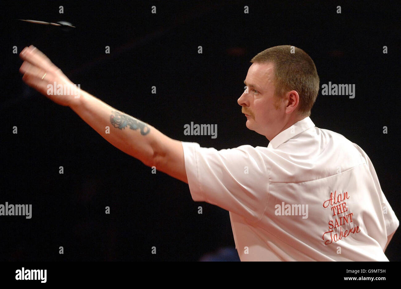 Half length mid top side view shortarrow serious action hi-res stock ...