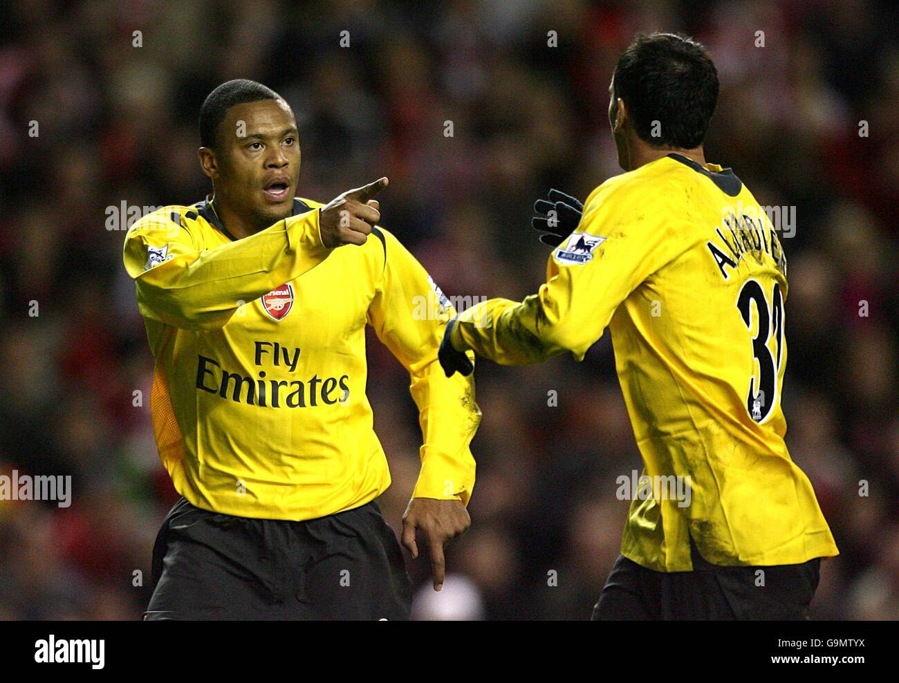 Arsenal's Cesar Julio Baptista (left) celebrates his hatrick Stock ...