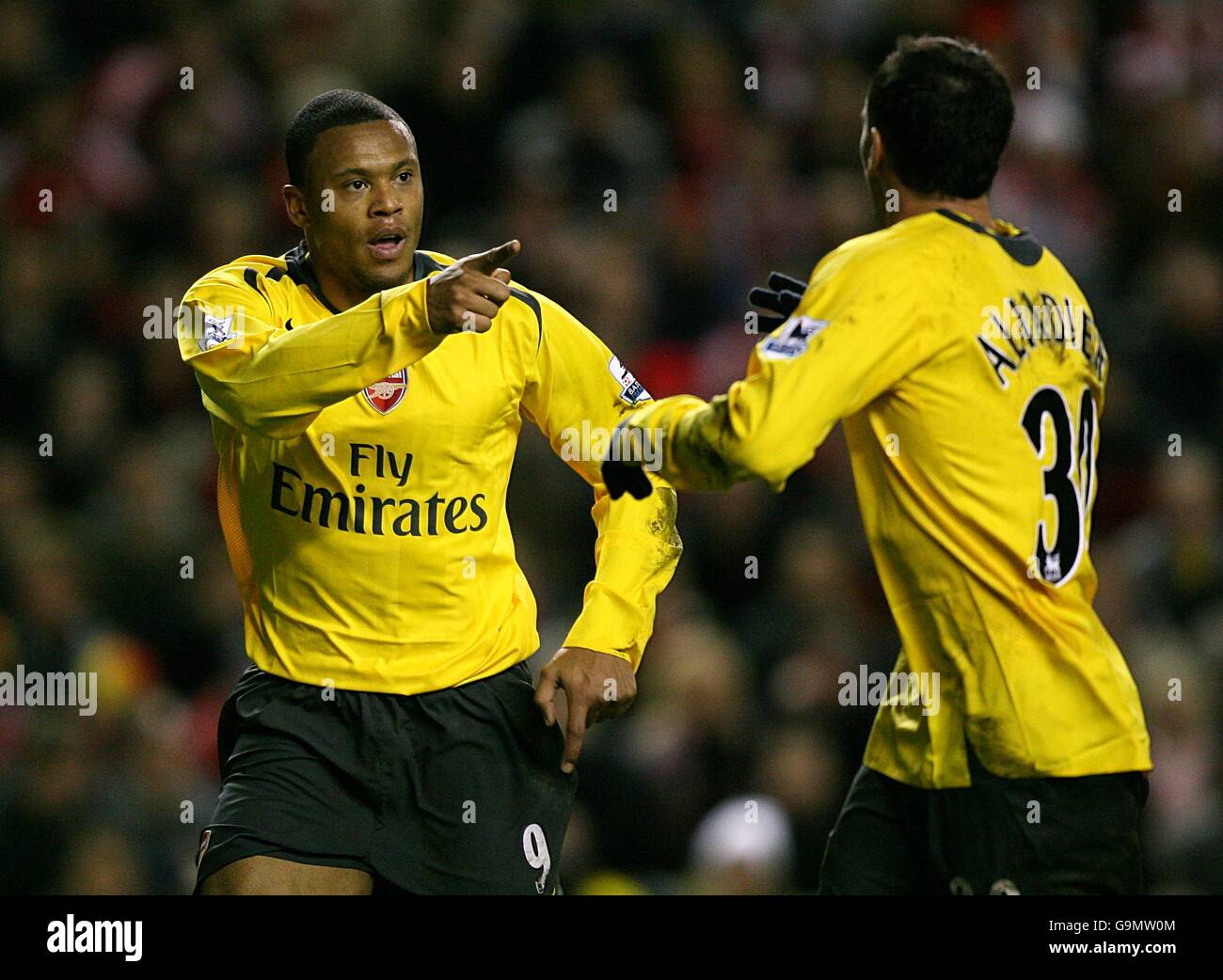 Arsenal's Julio Baptista celebrates his third goal to complete his hat ...