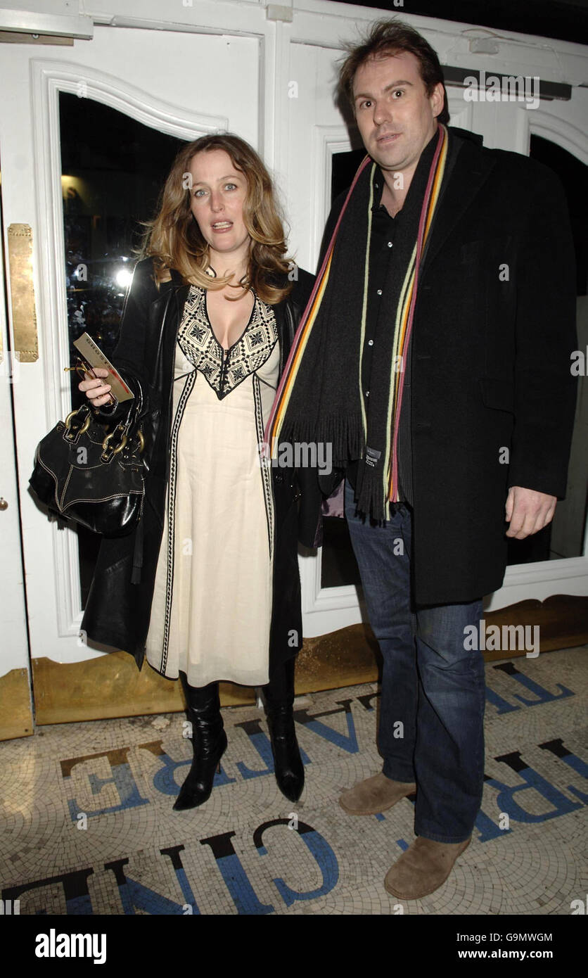 Gillian Anderson and her partner Mark Griffiths arriving for a benefit ...