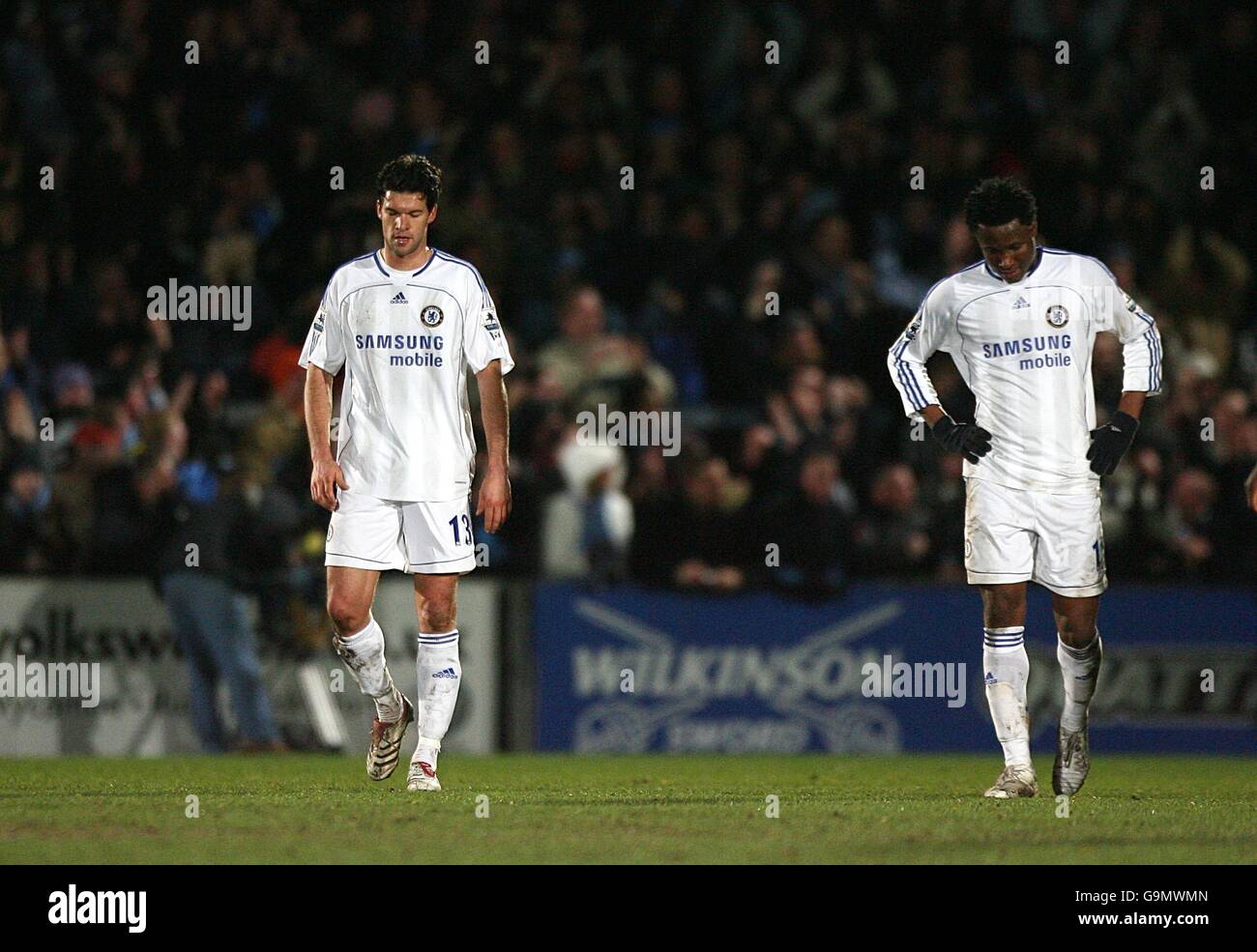 Chelsea's Michael Ballack amd John Mikel walk back dejected following ...