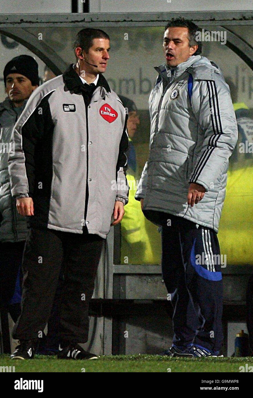 Chelsea manager Jose Mourinho (right) shows his frustration in front of ...