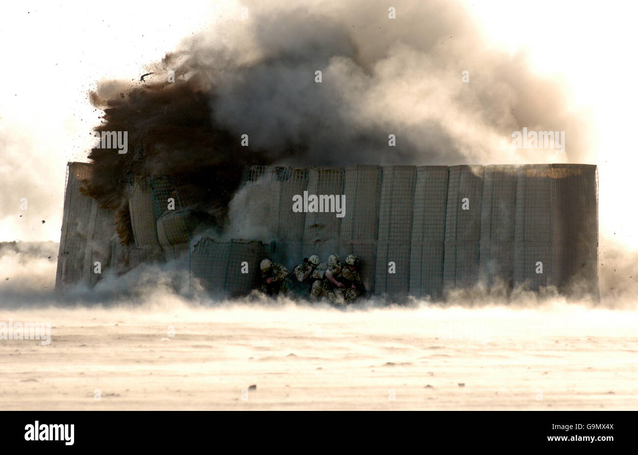 A Royal Marine company, Army Commando 59 practice their explosive entry ...