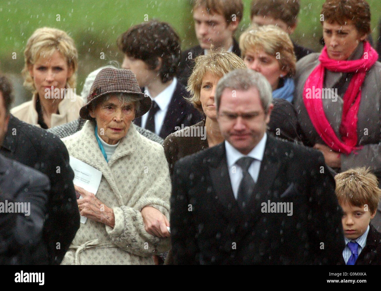 Mamie Magnusson (front left) follows the coffin of her husband Magnus ...