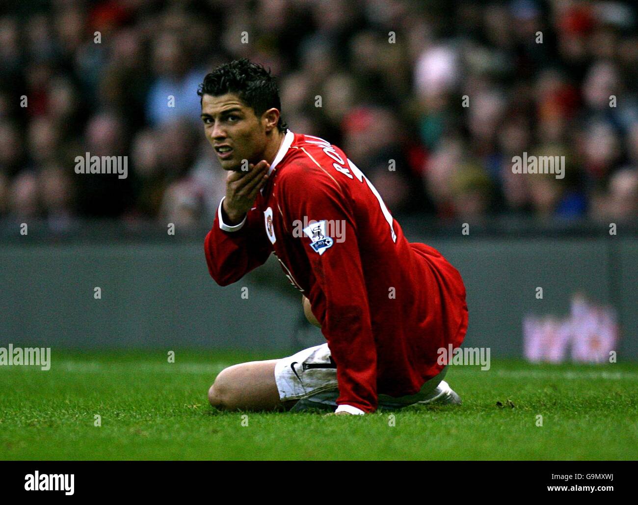 Manchester uniteds cristiano ronaldo holds his throat hi-res stock ...