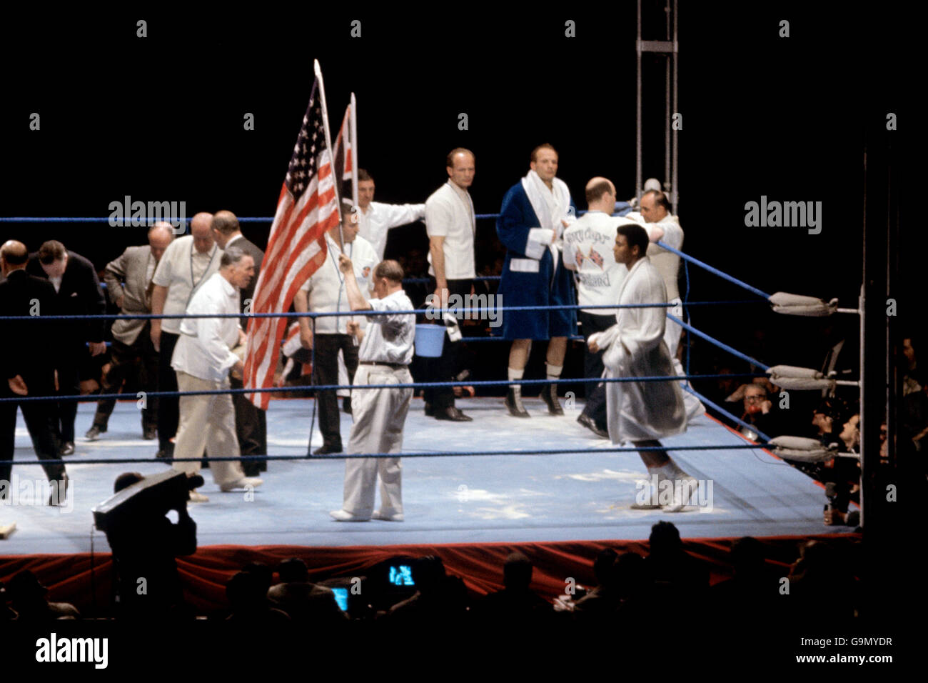 Mohammad Ali (Cassius Clay) and Henry Cooper prepare for their fight ...