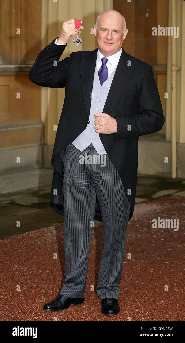 Head of EMI Eric Nicoli outside Buckingham Palace after receiving a CBE ...