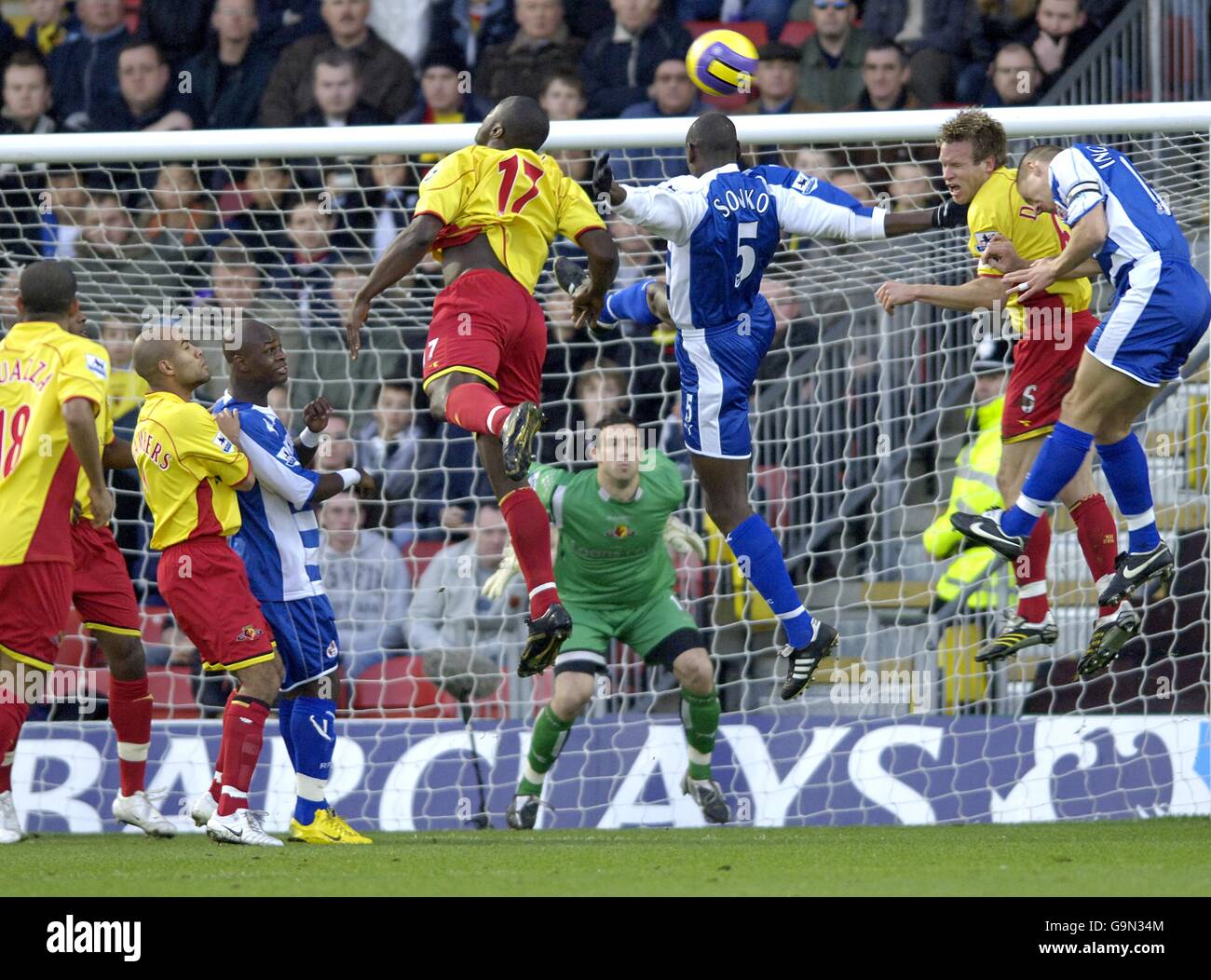 Reading's Ibrahima Sonko and Watford's Dan Shittu battle for the ball ...