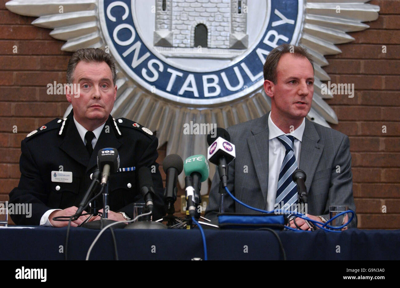 Chief Constable Alastair McWhirter, left, listens as Detective Chief ...