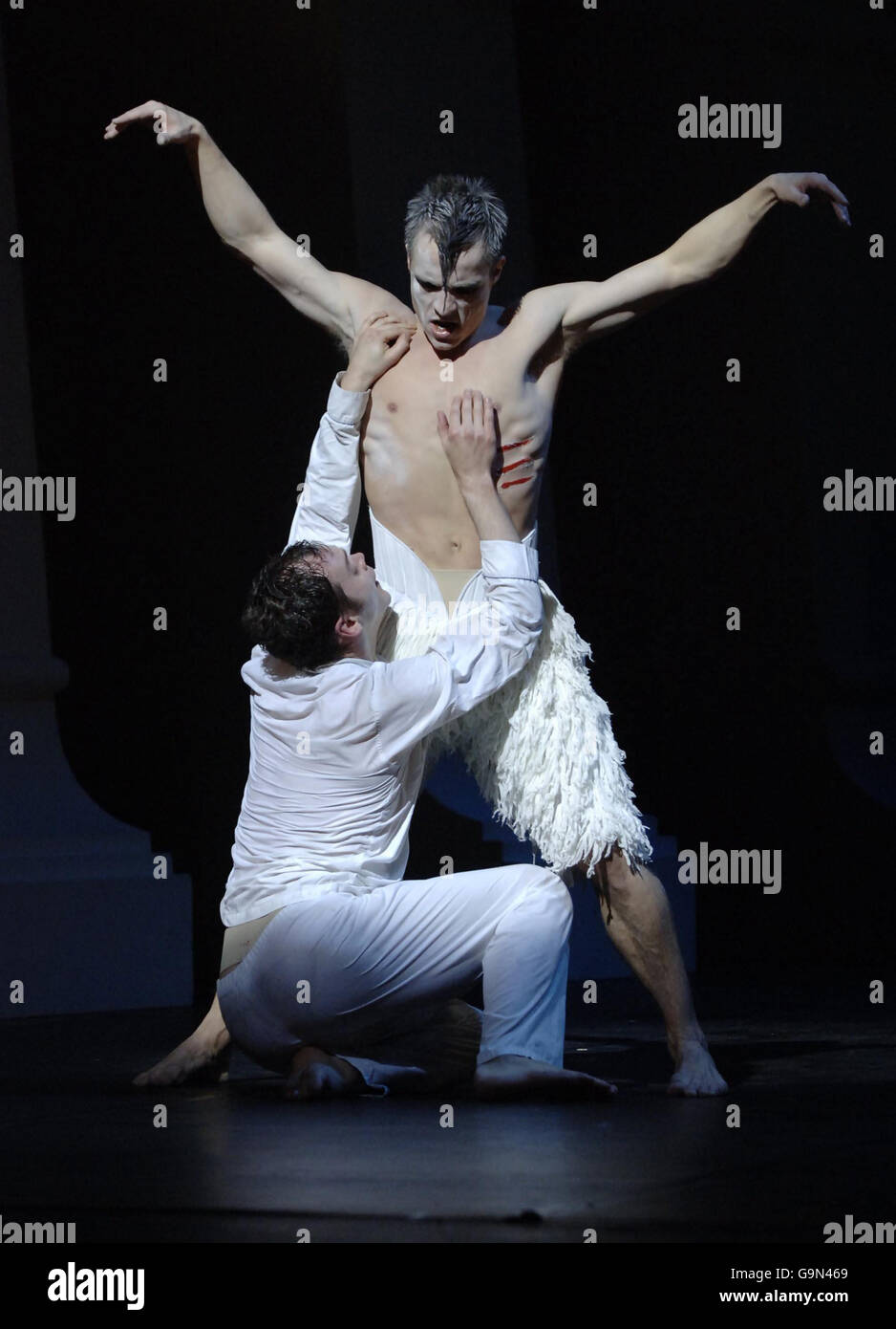 The cast performing on stage during a press photocall for the ballet ...
