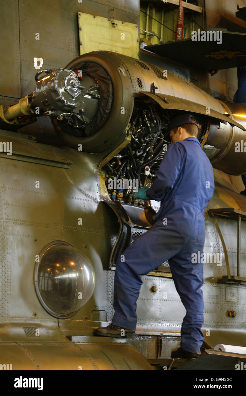Stock picture of a technician working on a Chinook helicopter at RAF ...