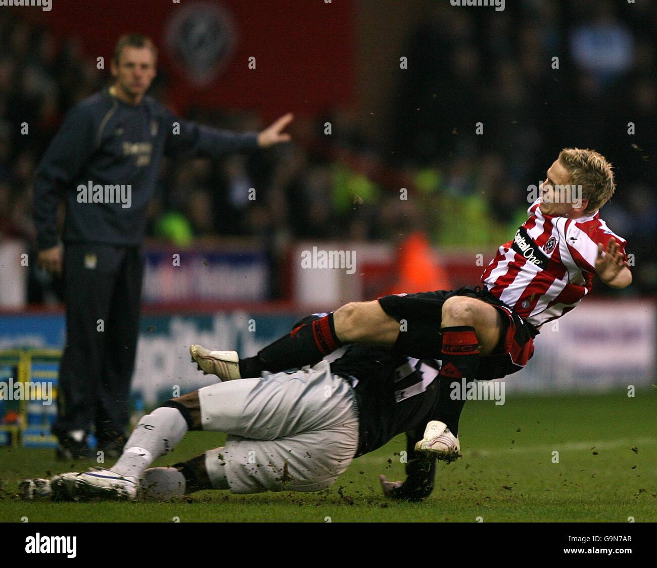 Sheffield united challenges manchester citys darius vassell hi-res ...