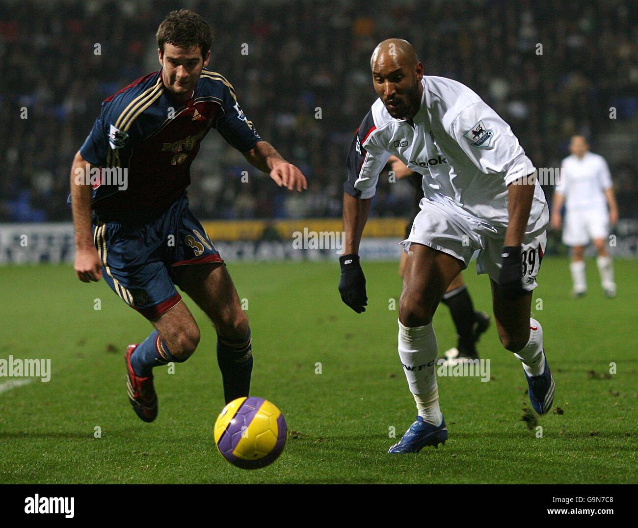 (l-r) David Edgar, Newcastle United and Nicolas Anelka, Bolton, battle ...