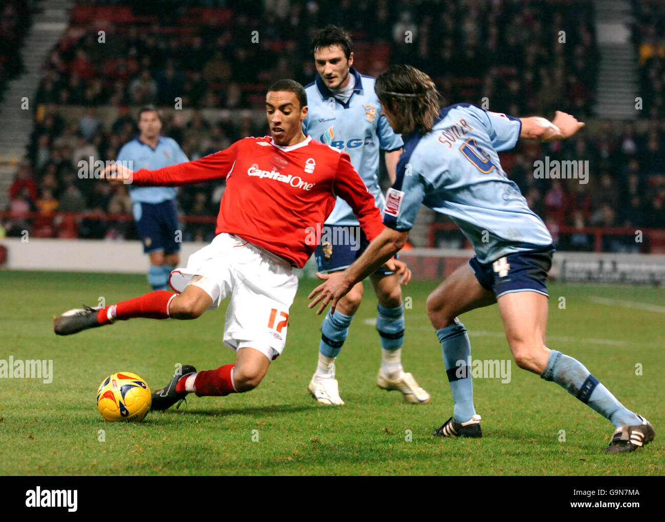 Nottingham Forest's James Perch and Port Vale's Danny Sonner in action ...