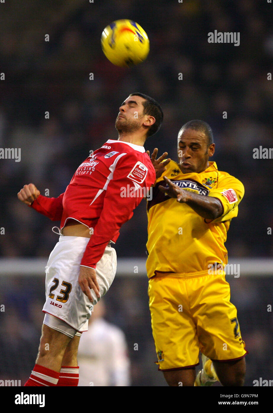 Barnsley's Daniel Nardiello and Burnley's Wayne Thomas Stock Photo - Alamy