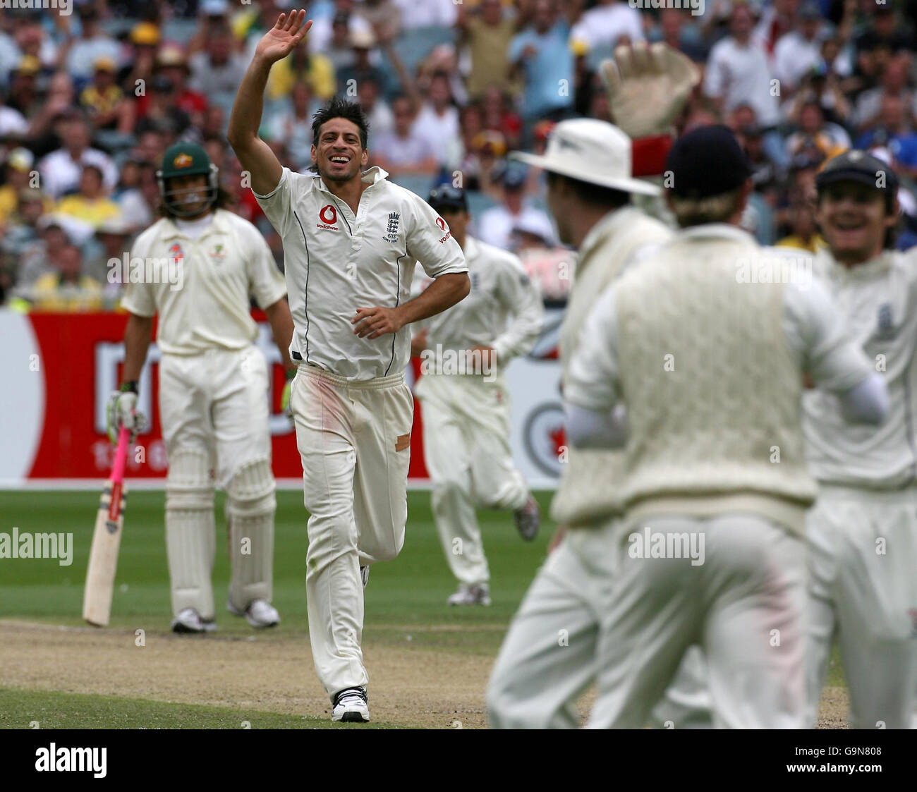 England's Sajid Mahmood celebrates after taking the wicket of Australia ...