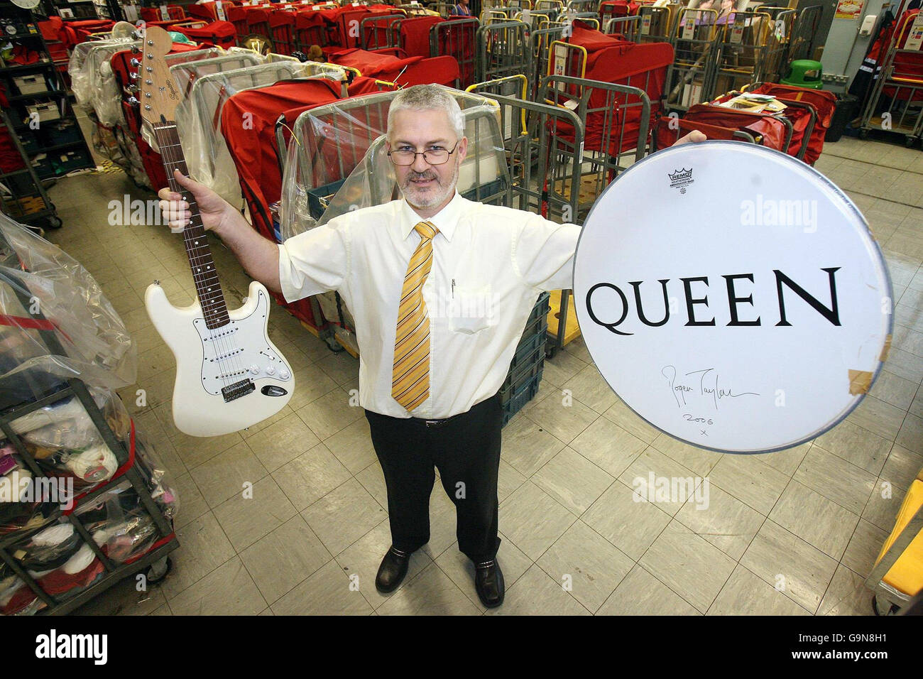 Centre Manager John McAleer with an electric guitar and a signed Queen ...