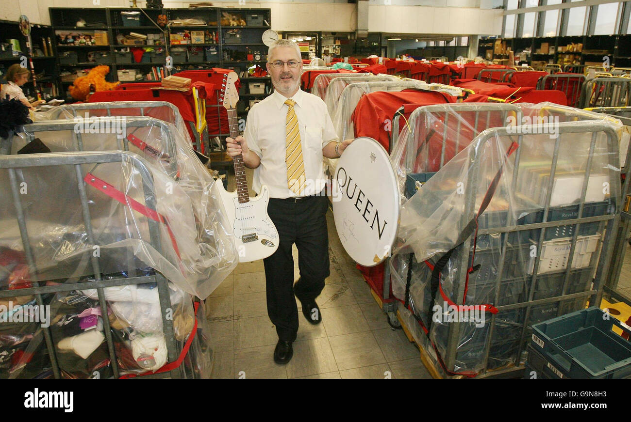 Centre Manager John McAleer with an electric guitar and a signed Queen ...