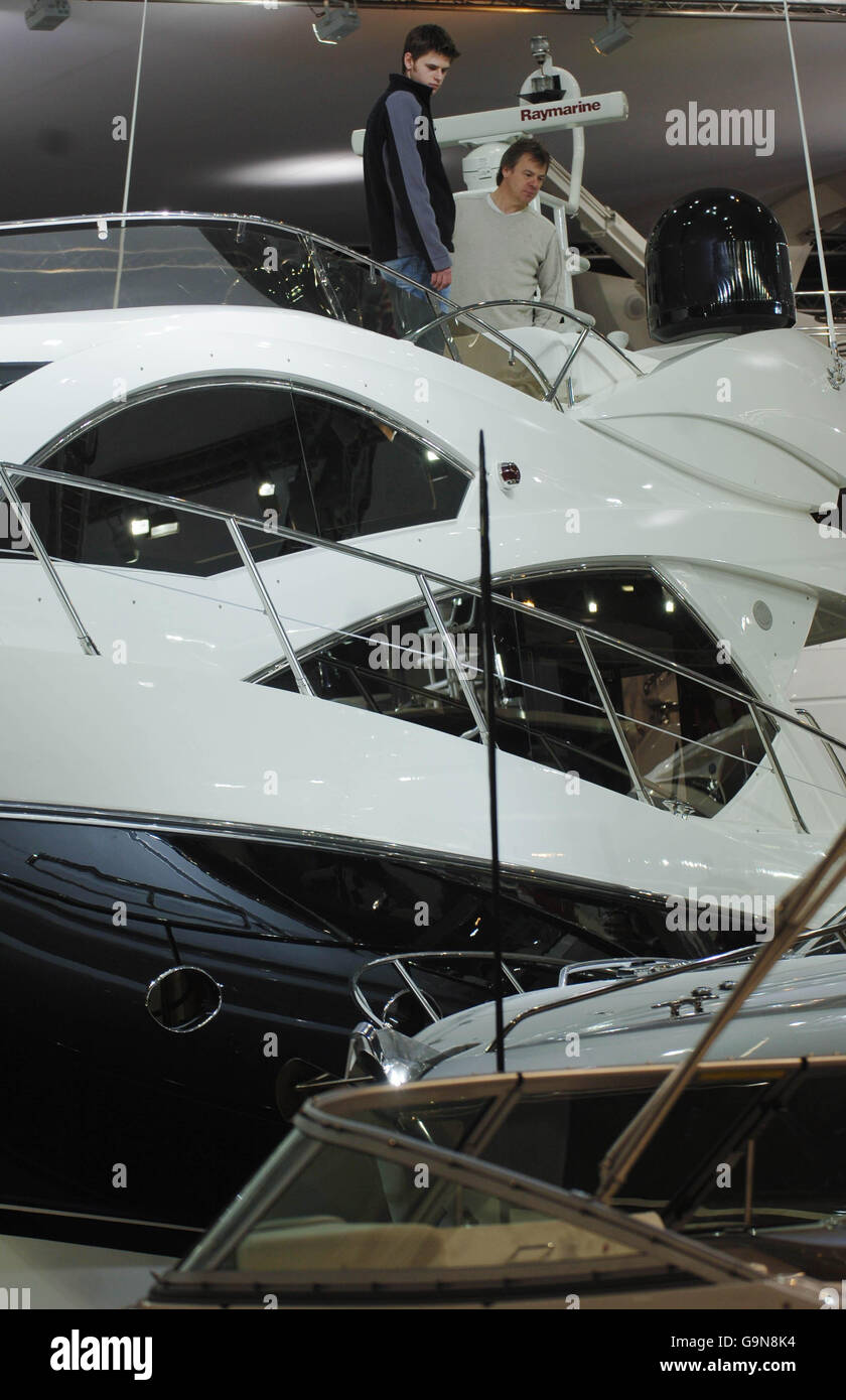 Sailing enthusiasts look at some of the yachts on display at this year ...