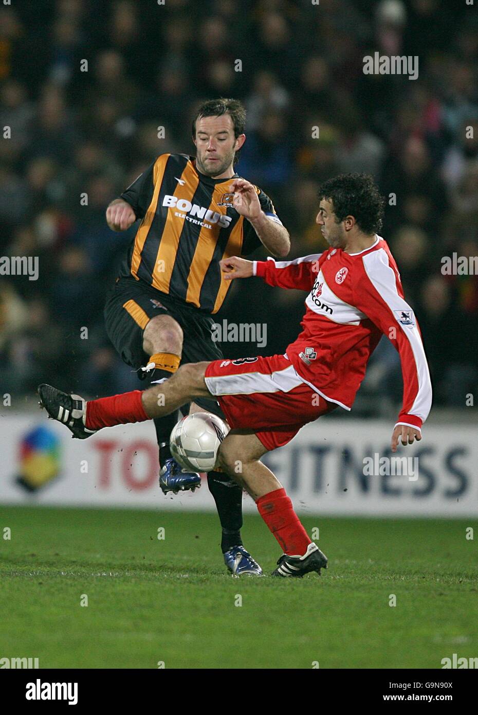 Middlesbrough's Julio Arca and Hull City's Ian Ashbee (l) battle for ...
