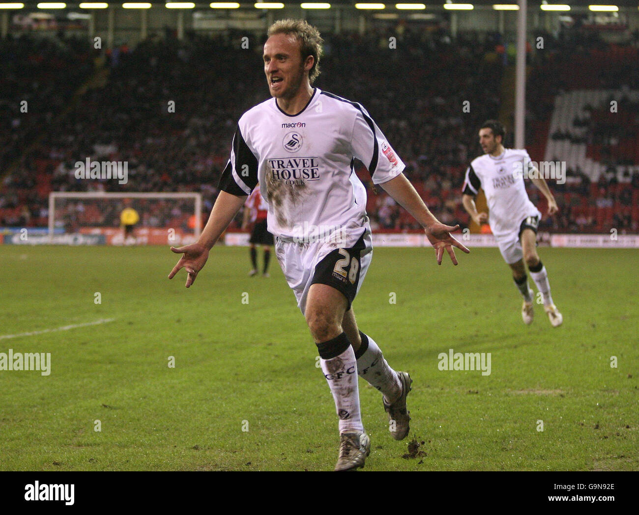 Swansea's Thomas Butler celebrates scoring against Sheffield United ...