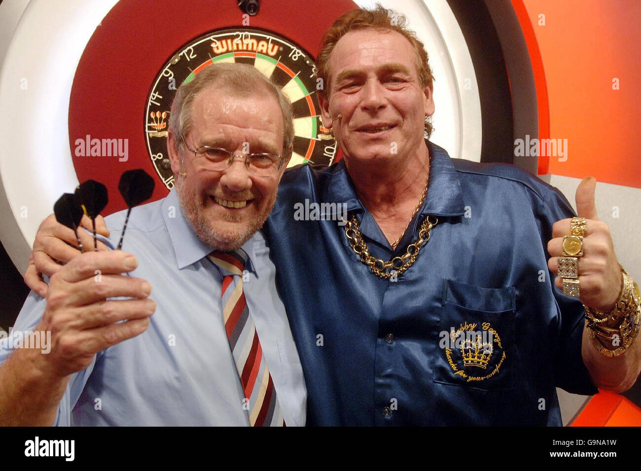 Minister for Sport Richard Caborn (left) with darts player Bobby George ...