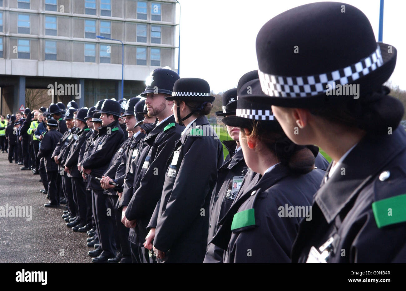 Police recruits at Hendon Police training centre in north London wait ...