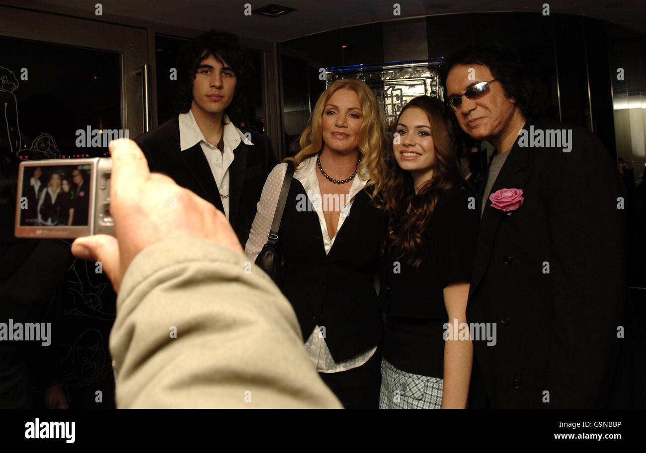 Gene Simmons (R) with his family (L-R) son Nick, partner Shannon Tweed ...