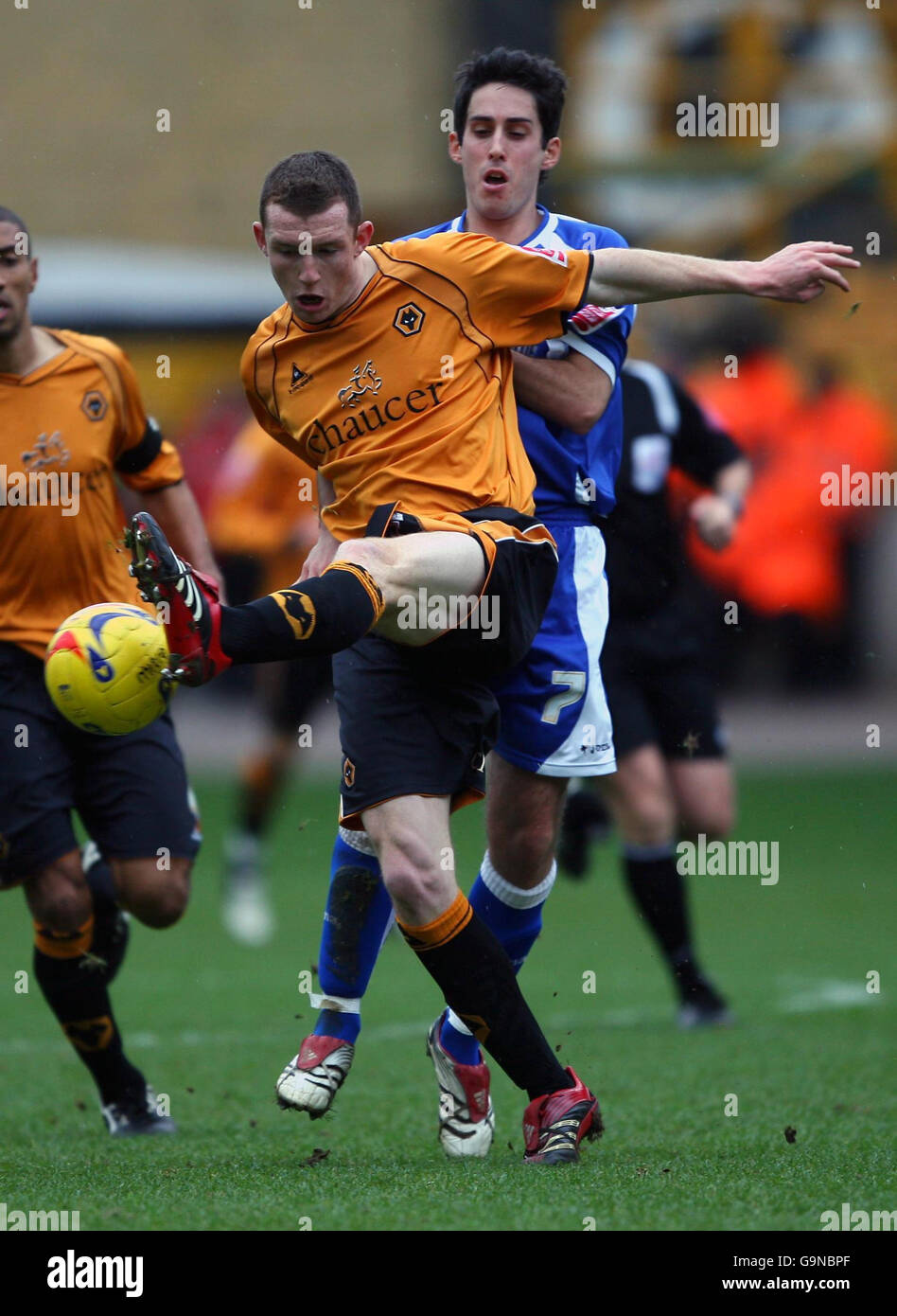 Wolverhampton Wanderers' Neill Collins (centre) and Cardiff City's ...