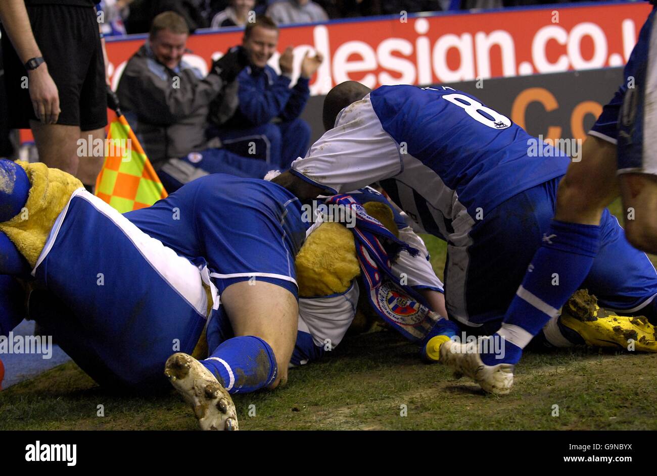 Reading's Shane Long celebrates his goal with the club mascot Stock ...