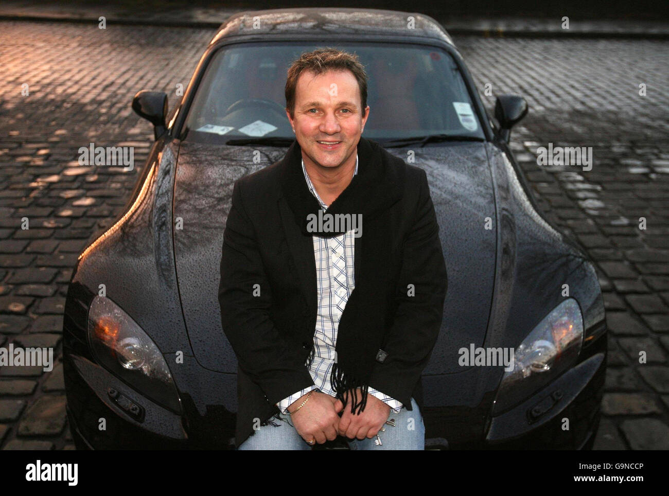 Brian Wiltshire sits on the bonnet of his car in Lancaster, after he ...