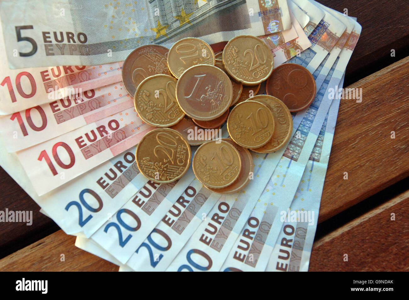 Euro coins and notes Stock Photo - Alamy