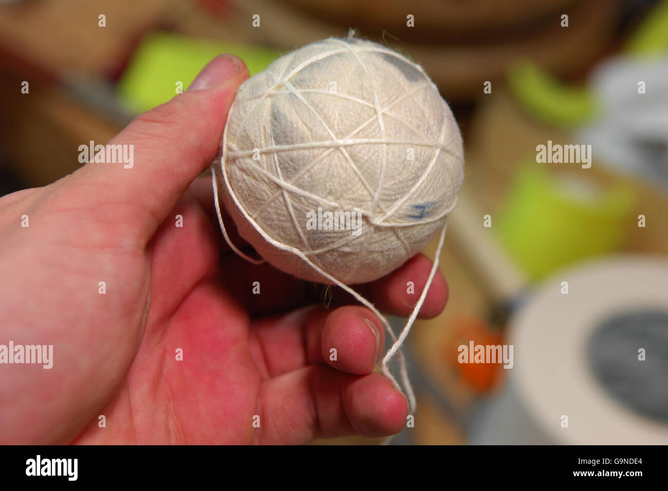 Ball making at queens club work shop hi-res stock photography and ...