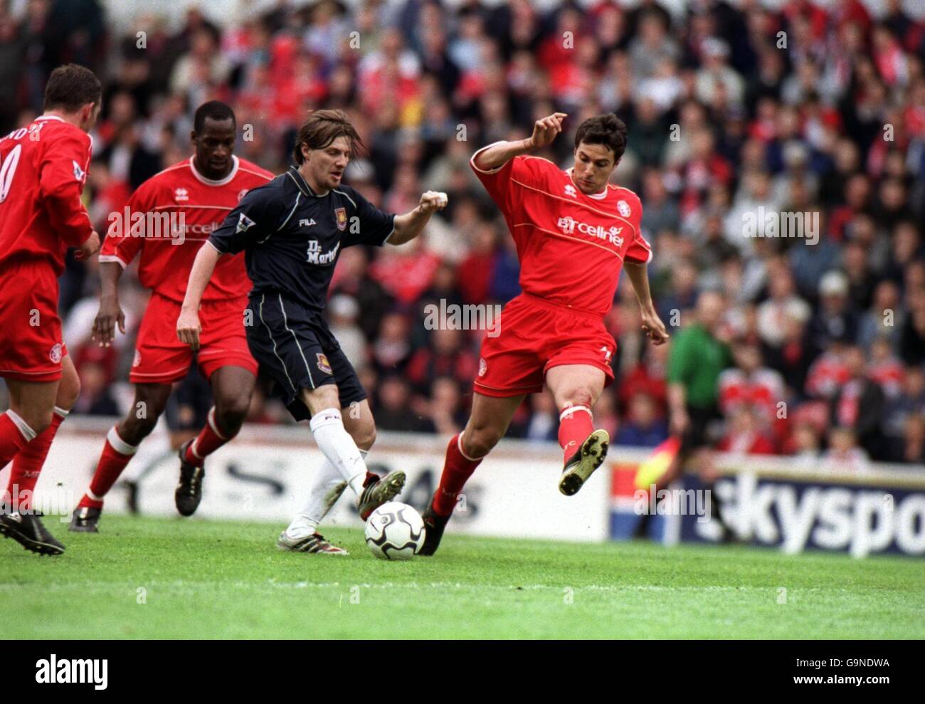 Middlesbrough's Paul Okon (r) closes down West Ham United's Sebastien ...