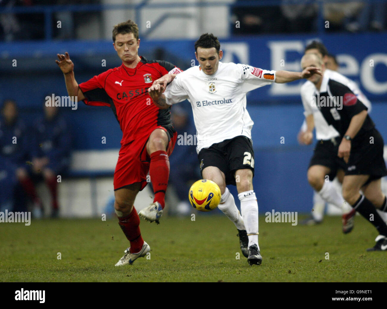 Luton's David Bell (right) challenges Coventry's Stephen Hughes during ...